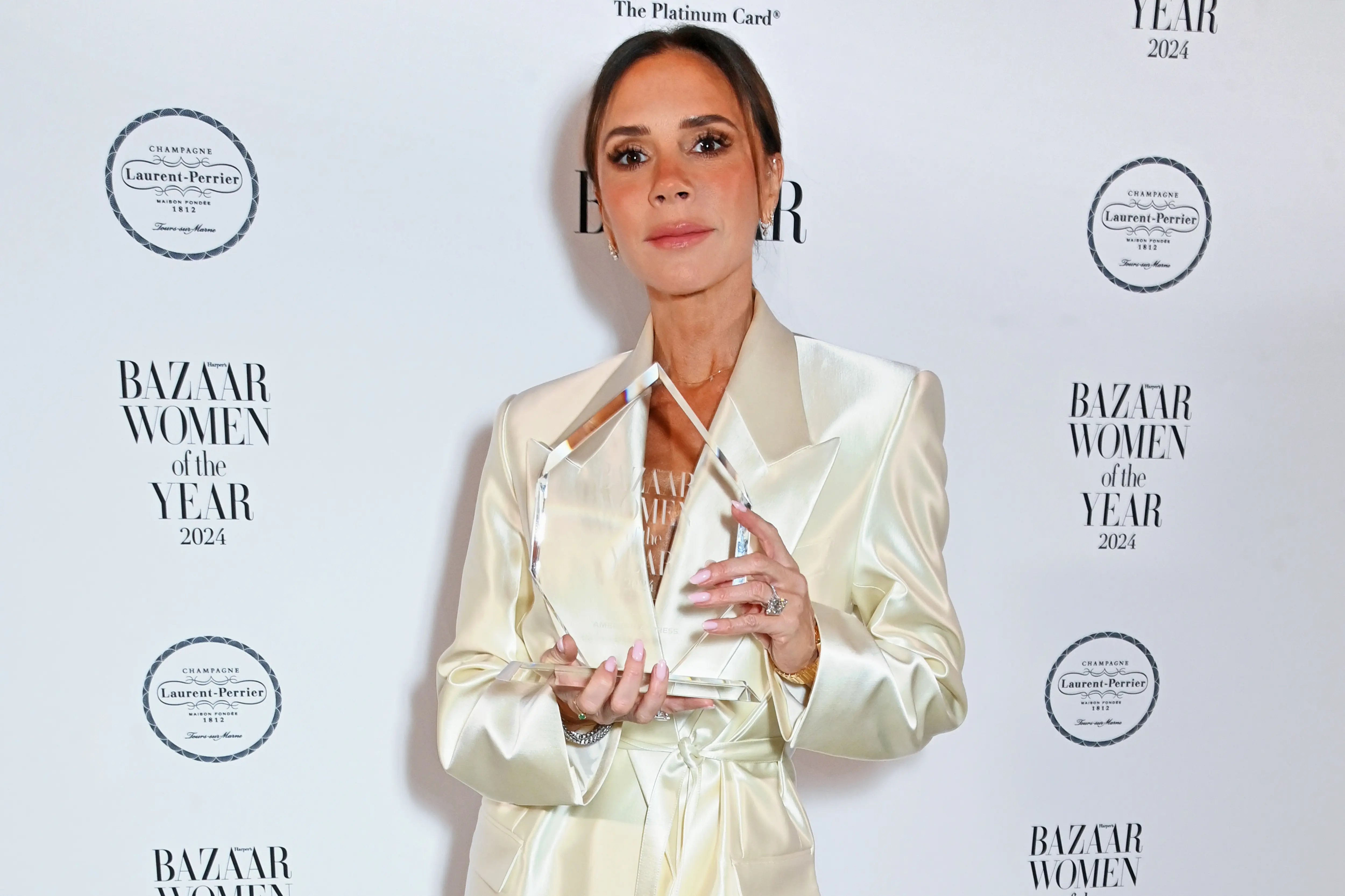 Victoria Beckham appears at Emma Bunton's birthday party shortly after ...