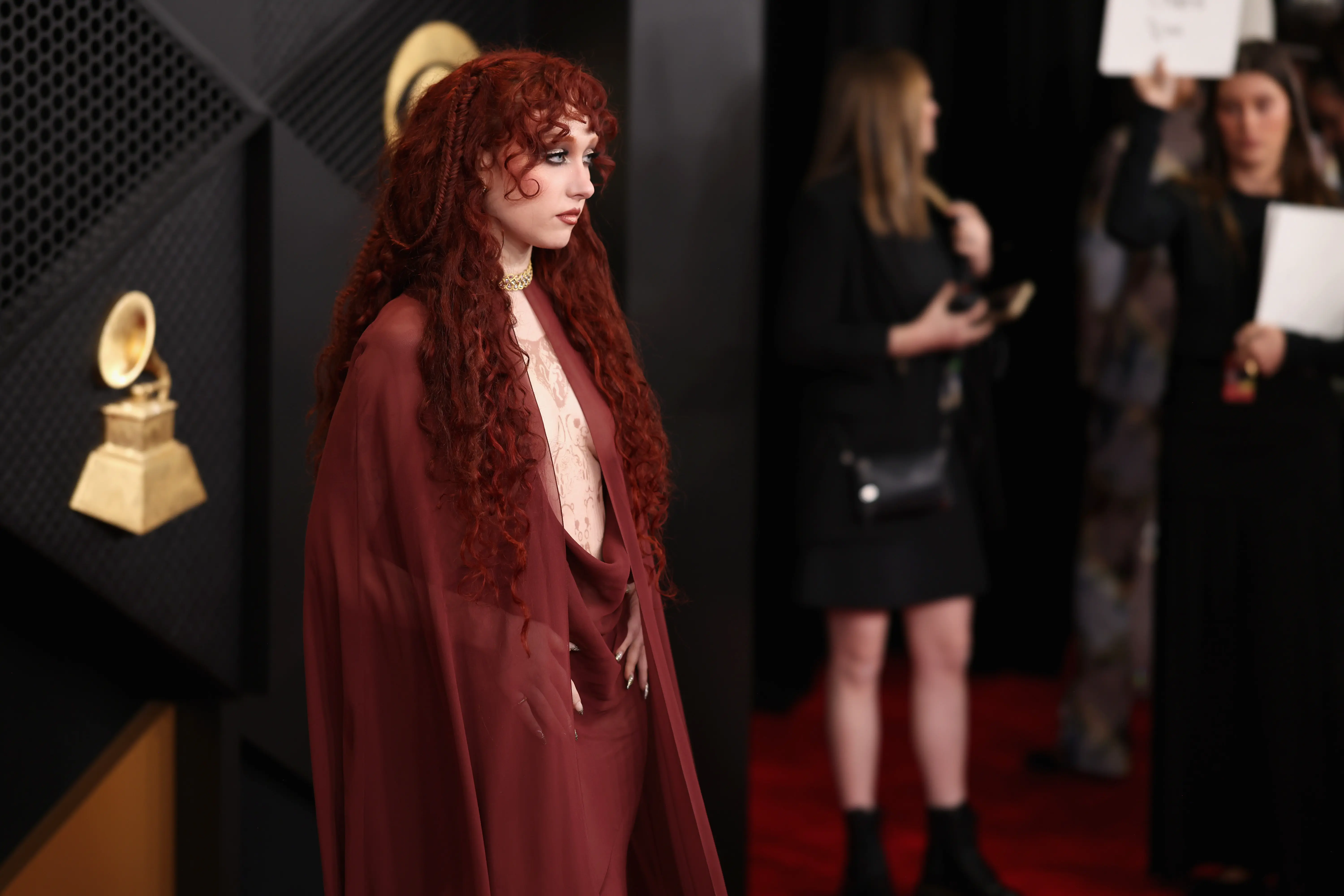 Who dressed Chappell Roan for Grammys 2026? Dress details, tattoos, and ...