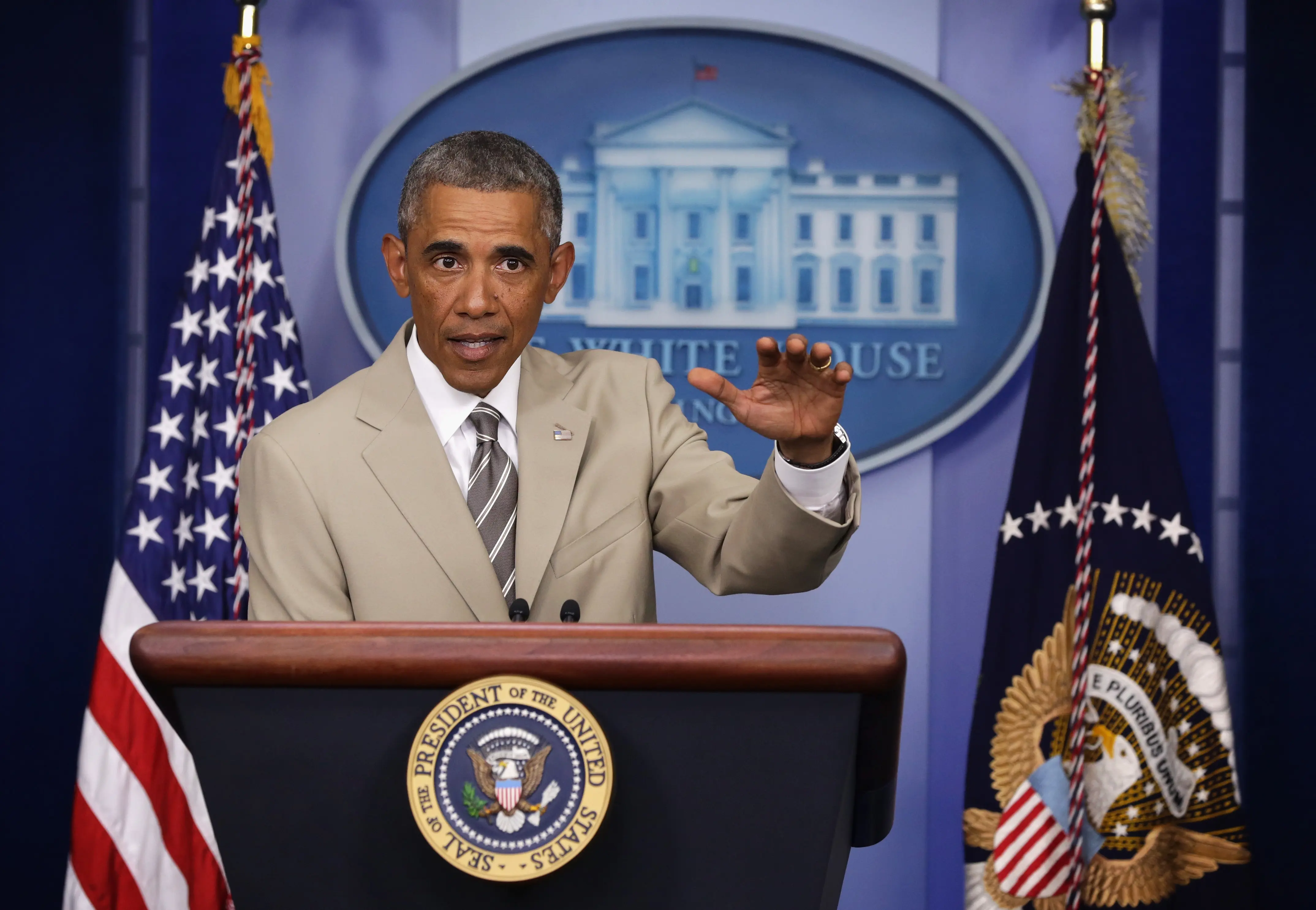 Is Obama tan suit family picture real or fake? Viral image mocking ...