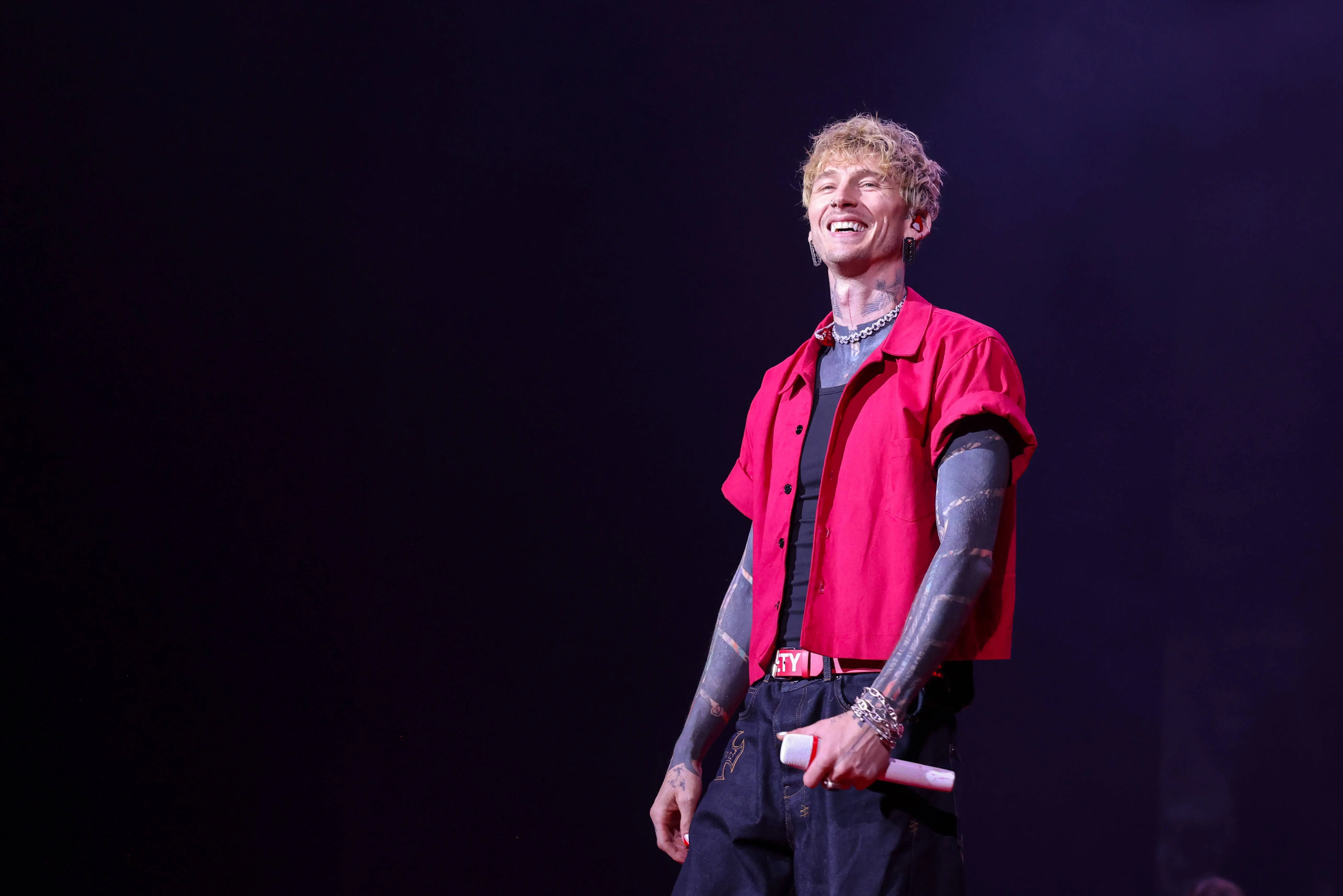 MGK reveals the painful reality behind his ambitious blackout tattoo ...